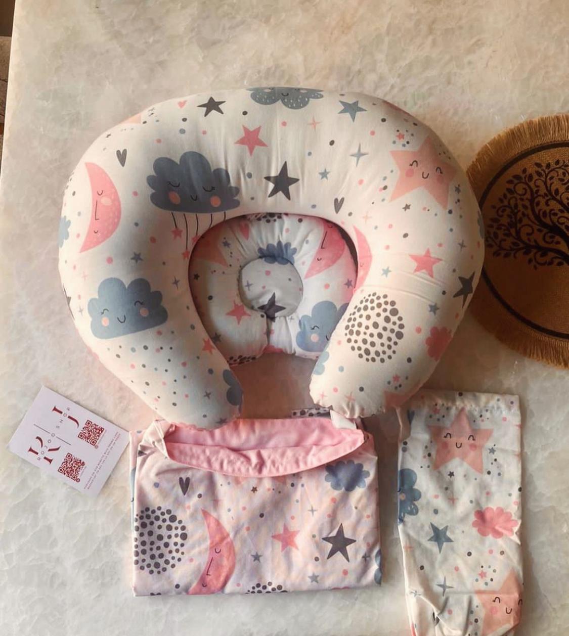 Pink set consisting of a breastfeeding cover + a breastfeeding pillow ...